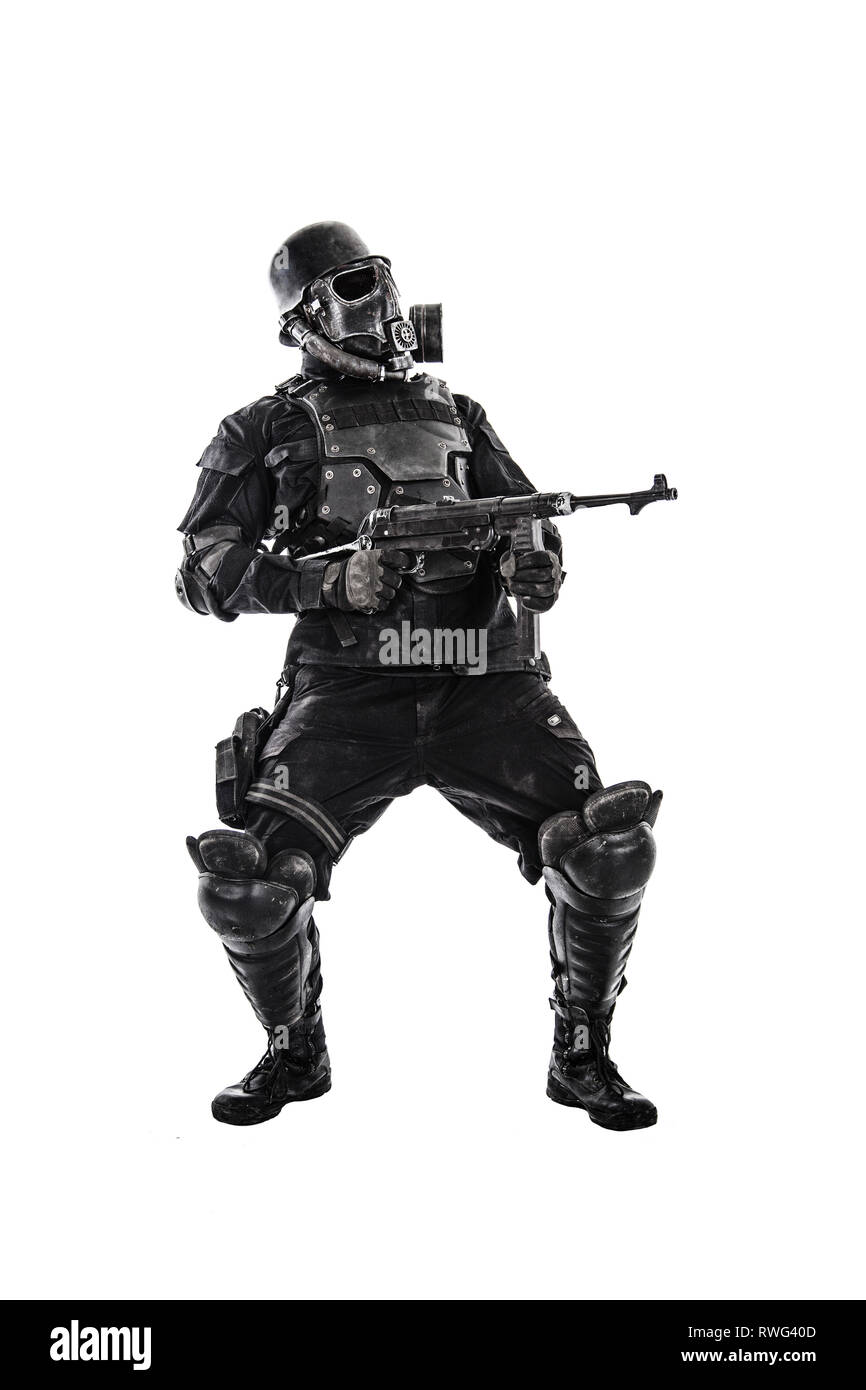 Full length portrait of a futuristic Nazi soldier with submachine gun ...