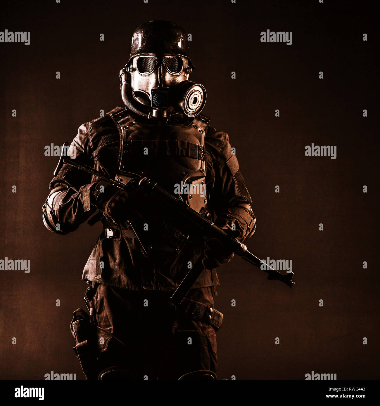 Futuristic Nazi soldier with submachine gun on dark background Stock ...