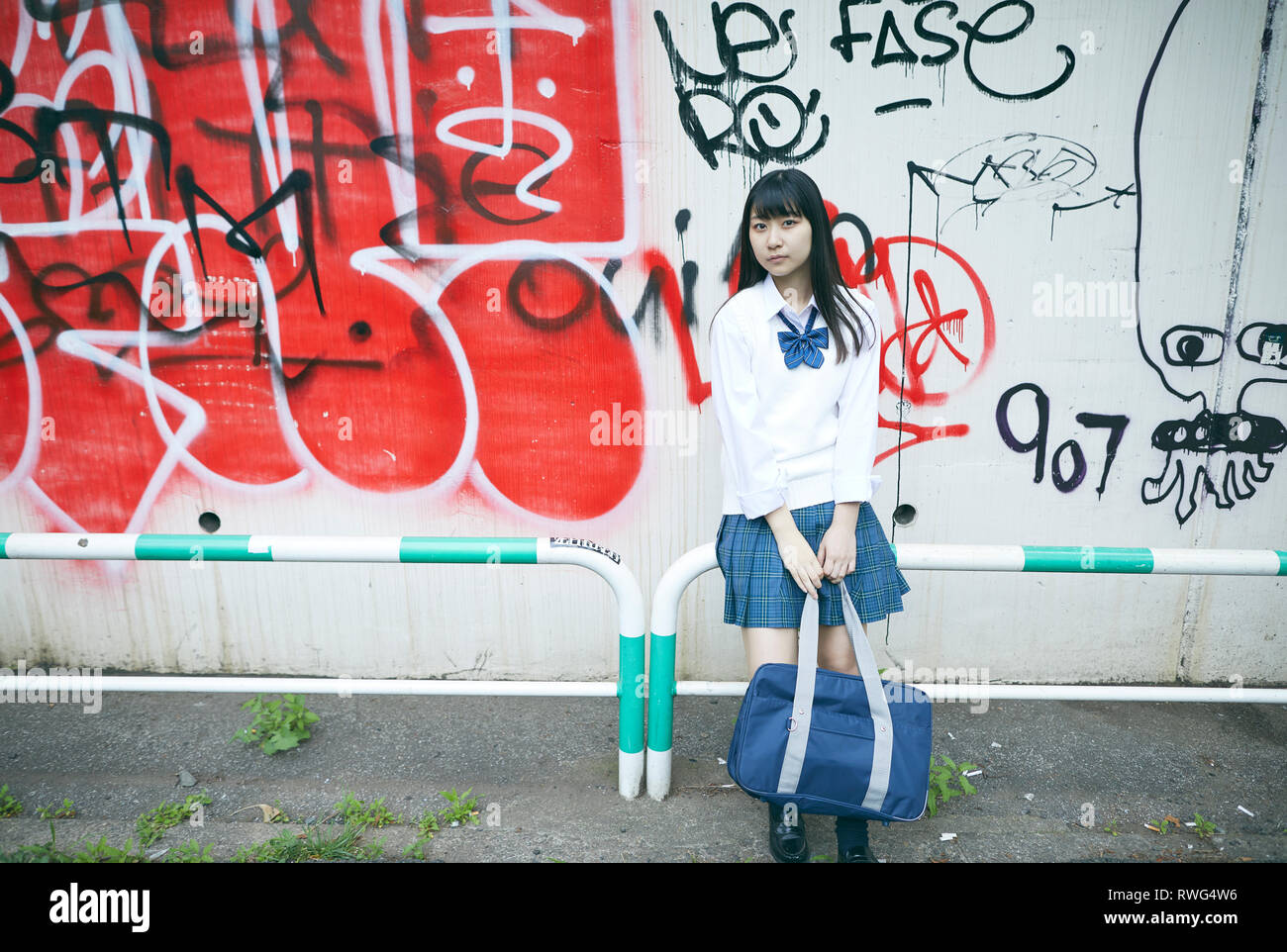 Japanese high school student in uniform downtown Tokyo Stock Photo - Alamy
