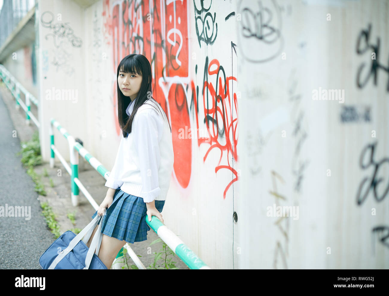 Japanese high school student in uniform downtown Tokyo Stock Photo - Alamy