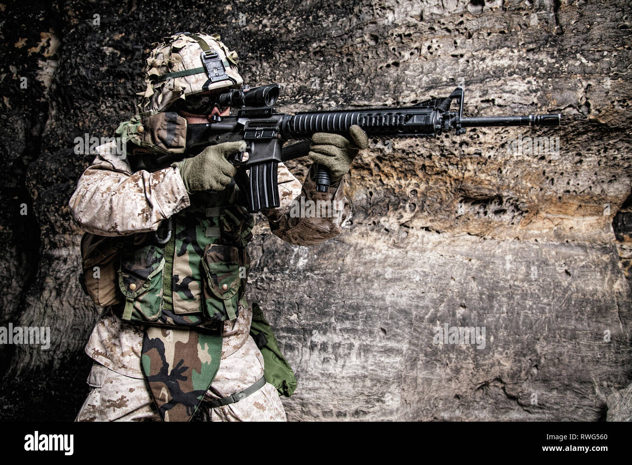 U.S. Marine Corps soldier in action among the rocks Stock Photo - Alamy