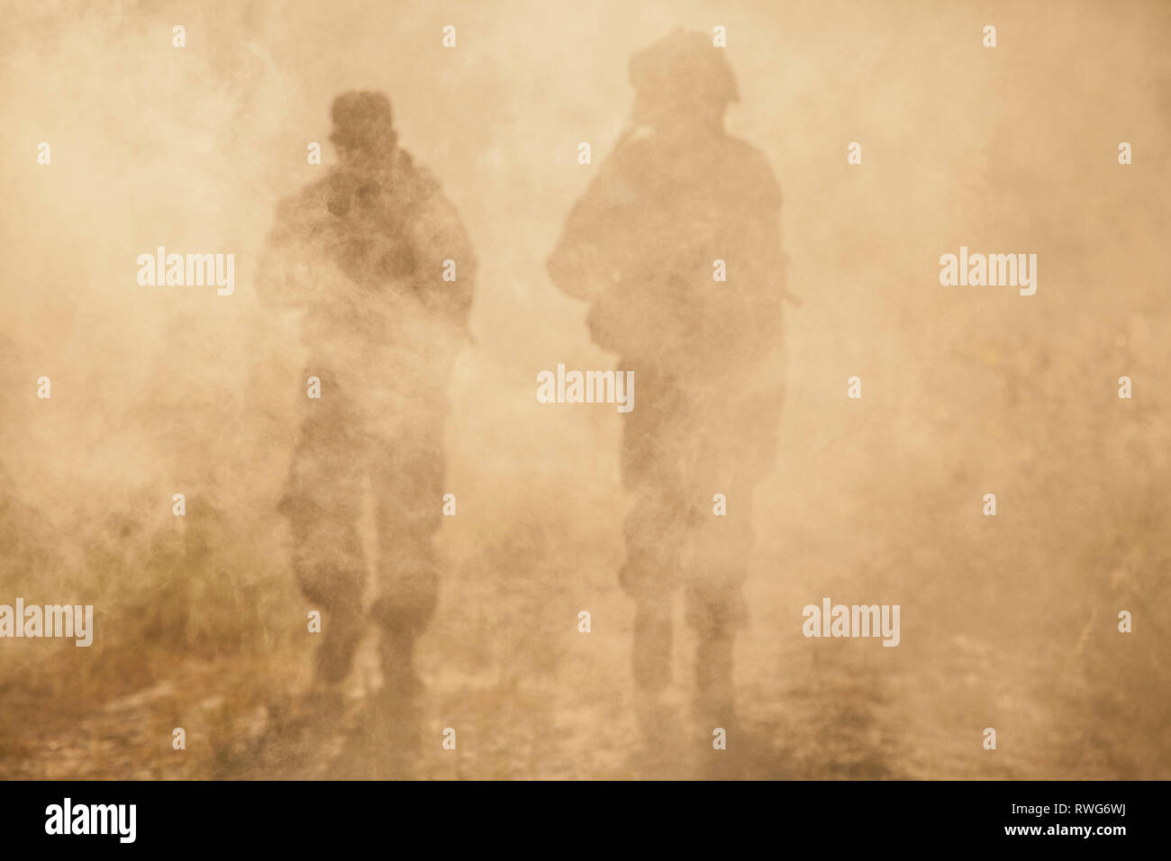 U.S. Marines in action on a smoke filled battlefield Stock Photo - Alamy