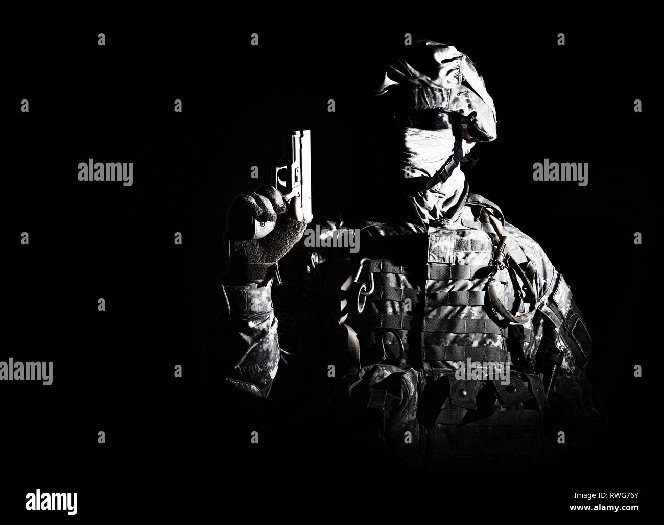 Special forces soldier with service pistol in hand Stock Photo - Alamy