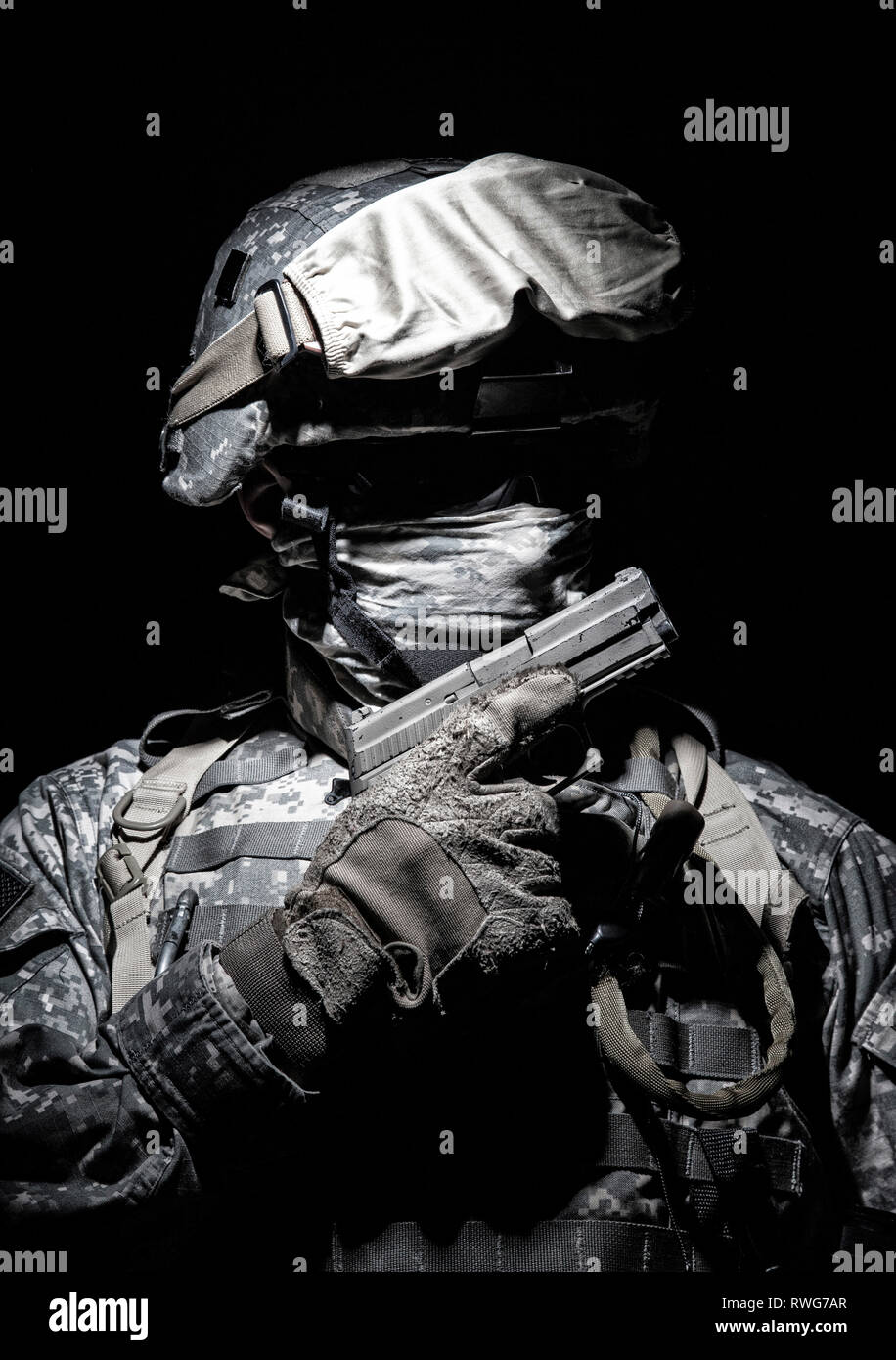 Portrait of commando with service pistol in hand Stock Photo - Alamy