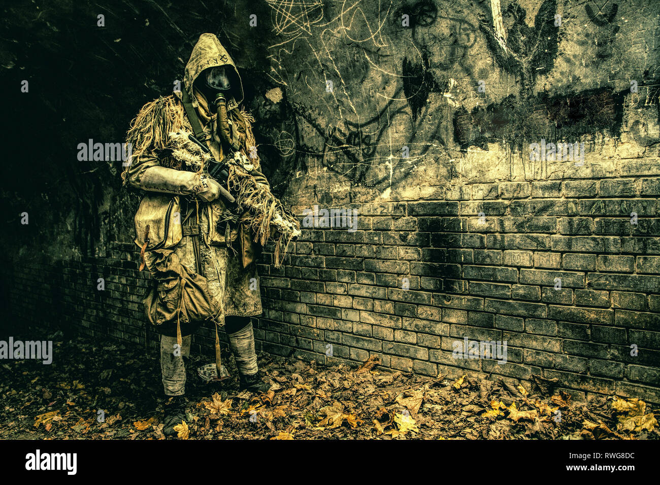 Post apocalyptic creature dressed in rags and gas mask, hiding in ...