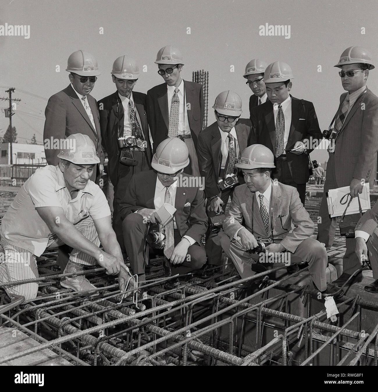 1970s, Los Angles, USA, a group of suited japanese property developers ...