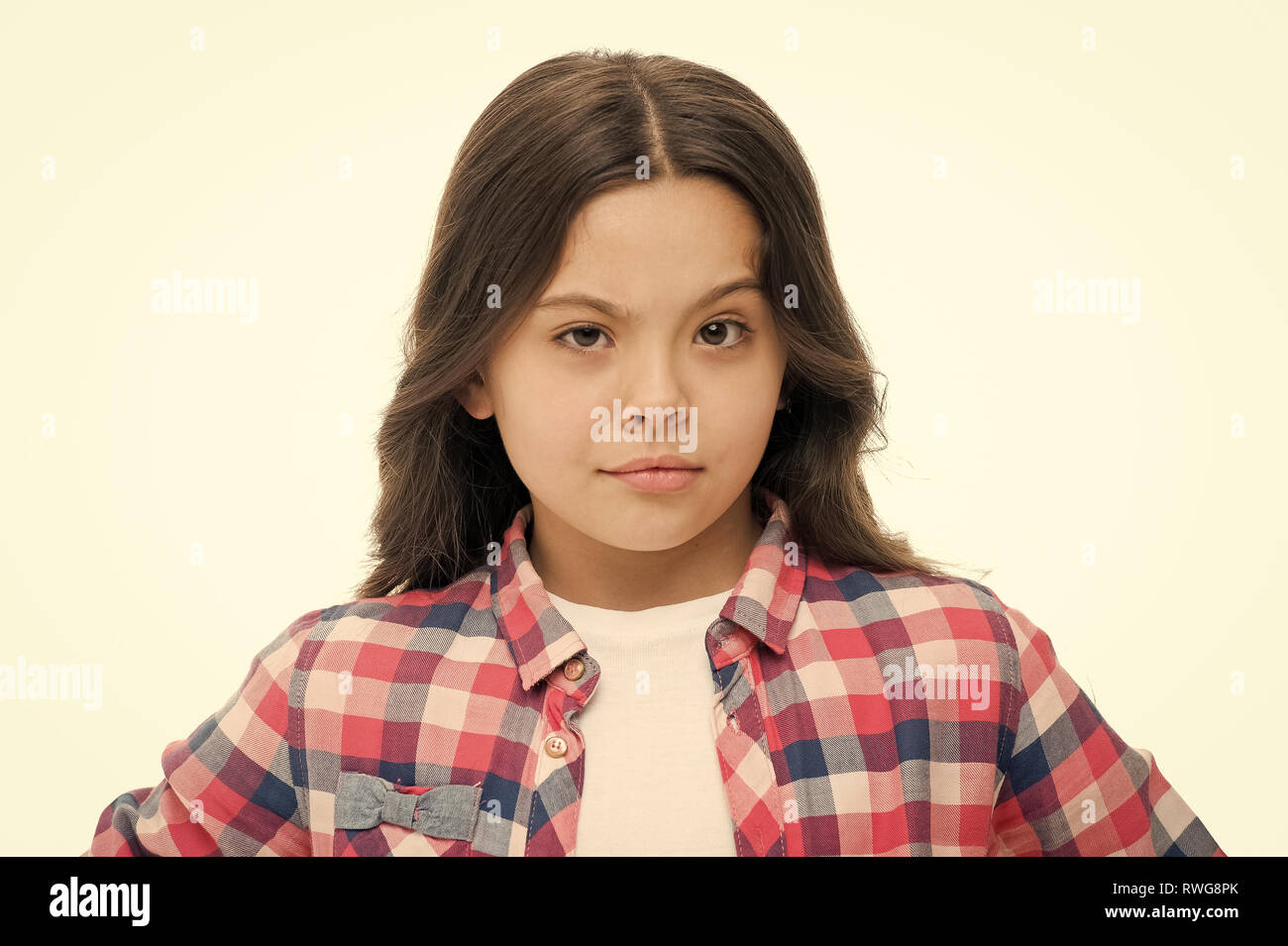 Little girl raise eyebrow isolated on white. Confident child with long ...