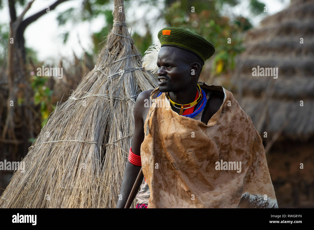 Karamojong man in the village, northern Uganda Stock Photo - Alamy