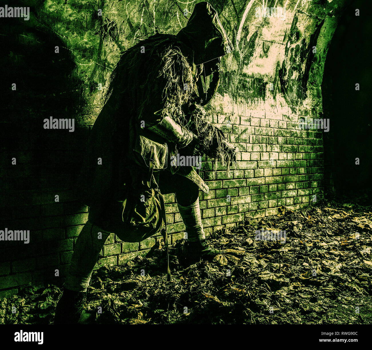 Post apocalyptic mutant wearing tattered rags in a dungeon with ...