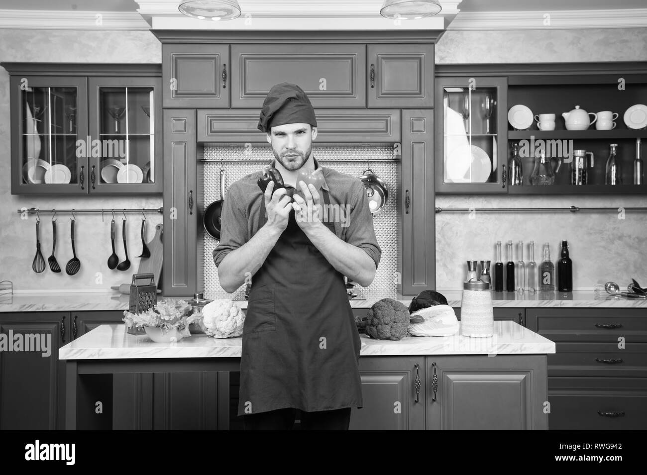 Pick fresh vegetables. Chef cooking vegetarian recipe. Man chef wear ...