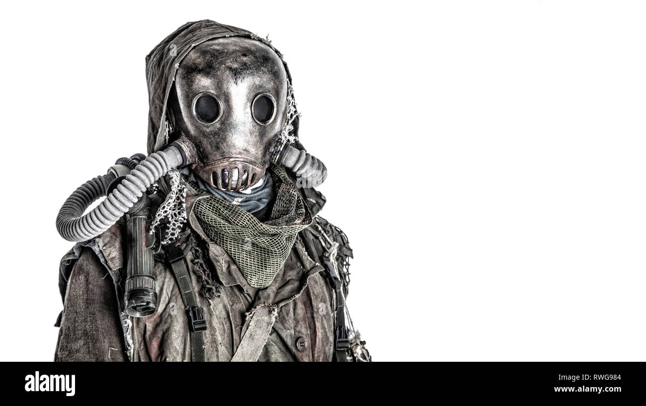 Scary post apocalyptic survivor wearing full-face gas mask under ...