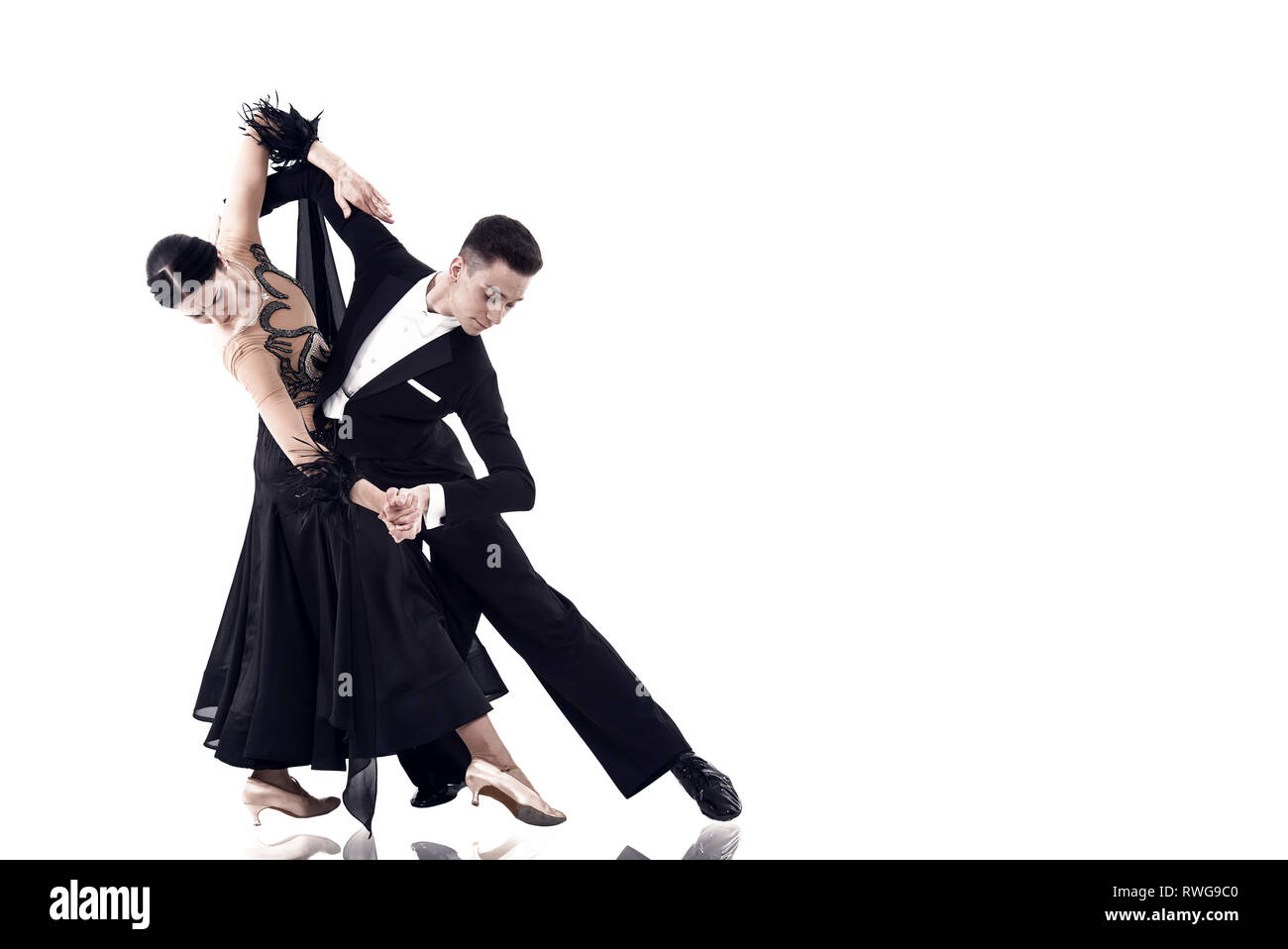 ballroom dance couple in a dance pose isolated on white background ...