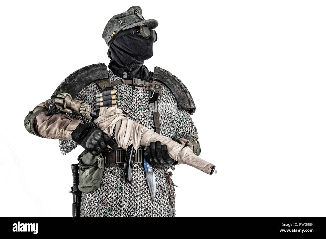 Post apocalyptic soldier wearing handmade armor, aiming submachine gun ...