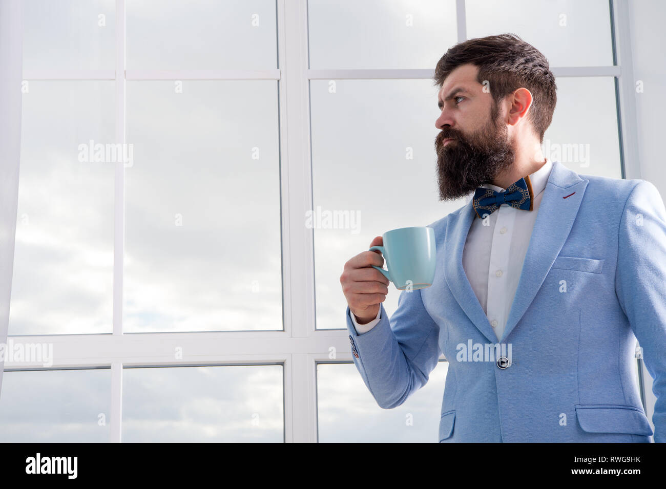 modern businessman. thoughtful bearded man drink coffee. businessman in ...