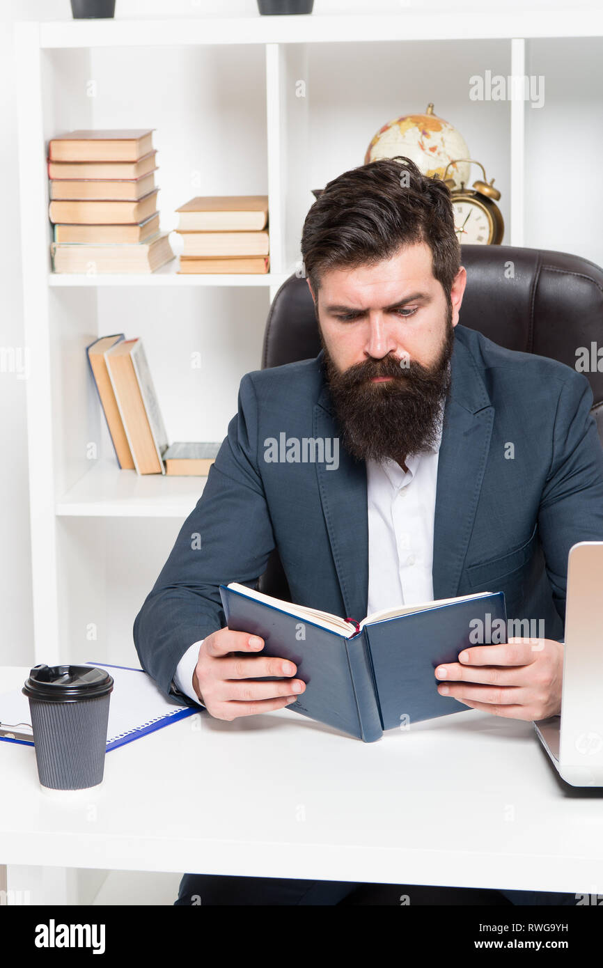 Check if i have time today. Man bearded hipster boss sit in leather ...