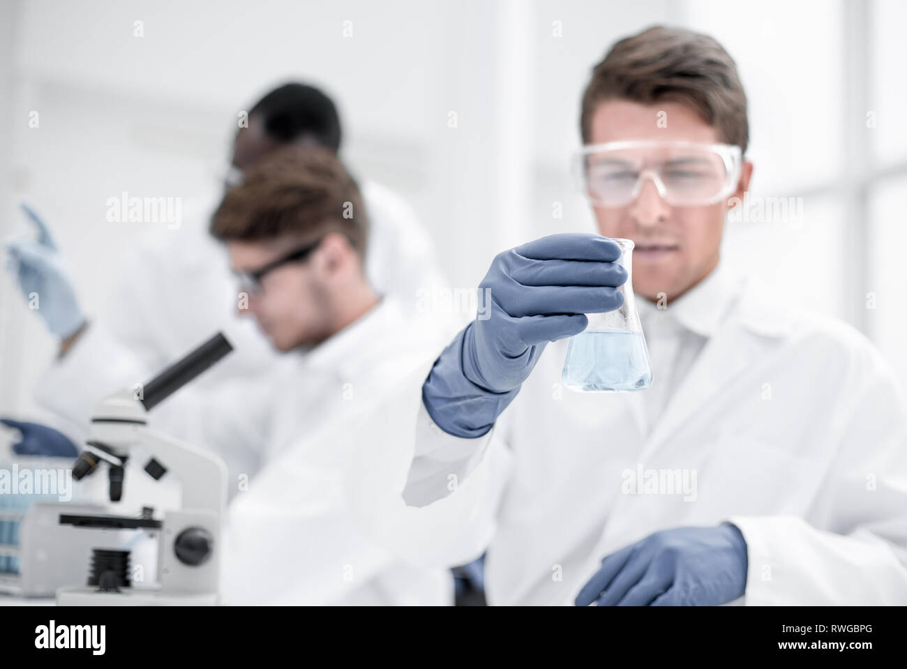 Group serious scientists using hi-res stock photography and images - Alamy