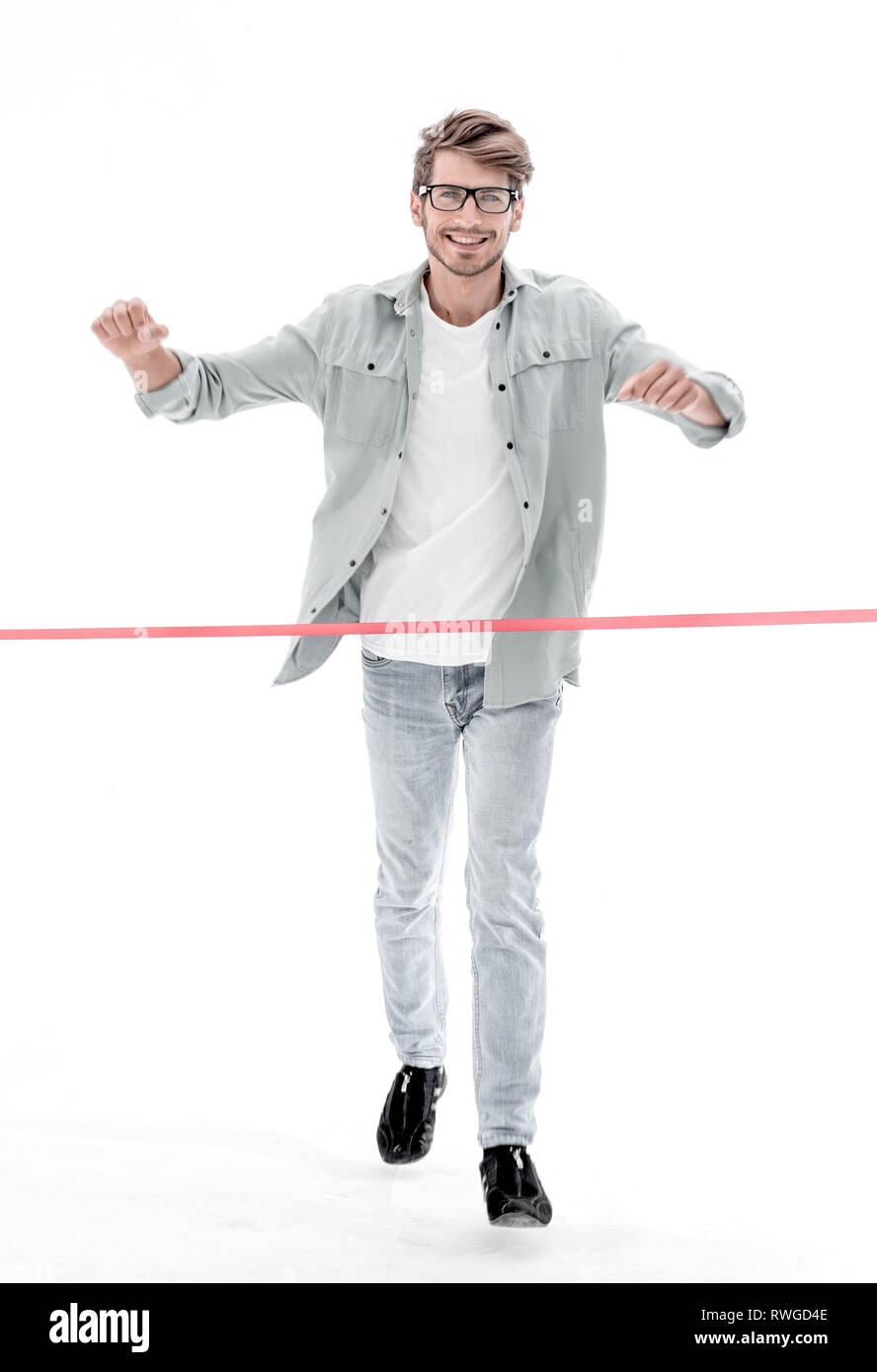 Happy businessman running through finishing line. Isolated on white ...