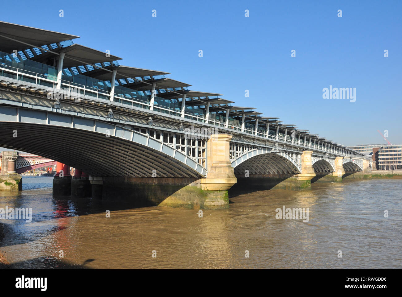 Blackfriars railway bridge and station over the River Thames, London ...