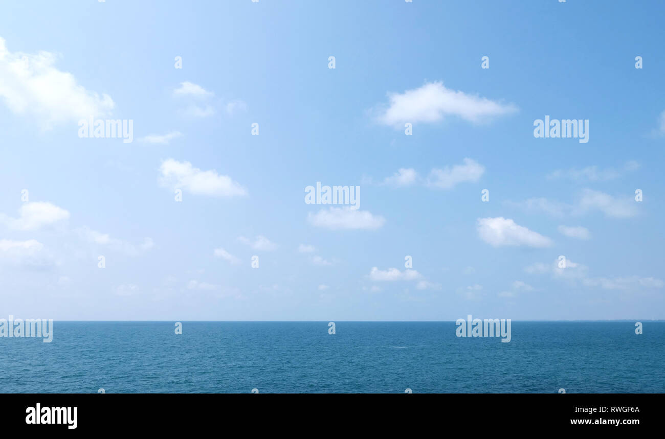 Blue sky with clouds and sea Stock Photo - Alamy