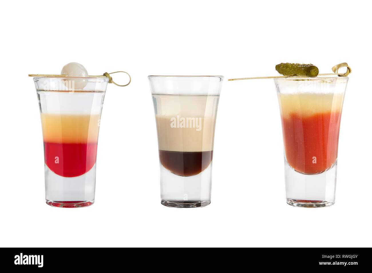 Popular alcohol shots on a white background. Three shots strong alcohol ...