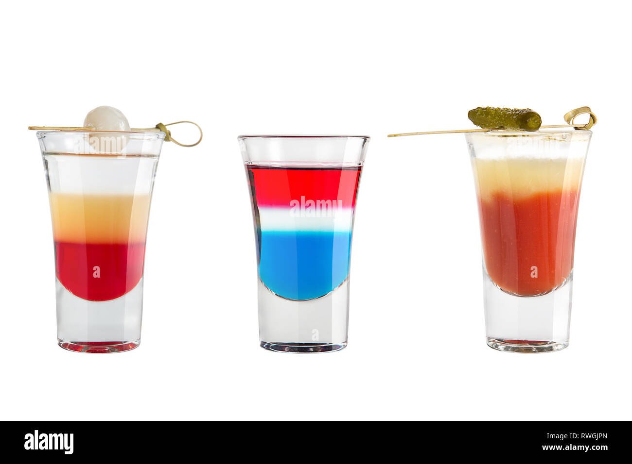 Popular alcohol shots on a white background. Three popular shots ...