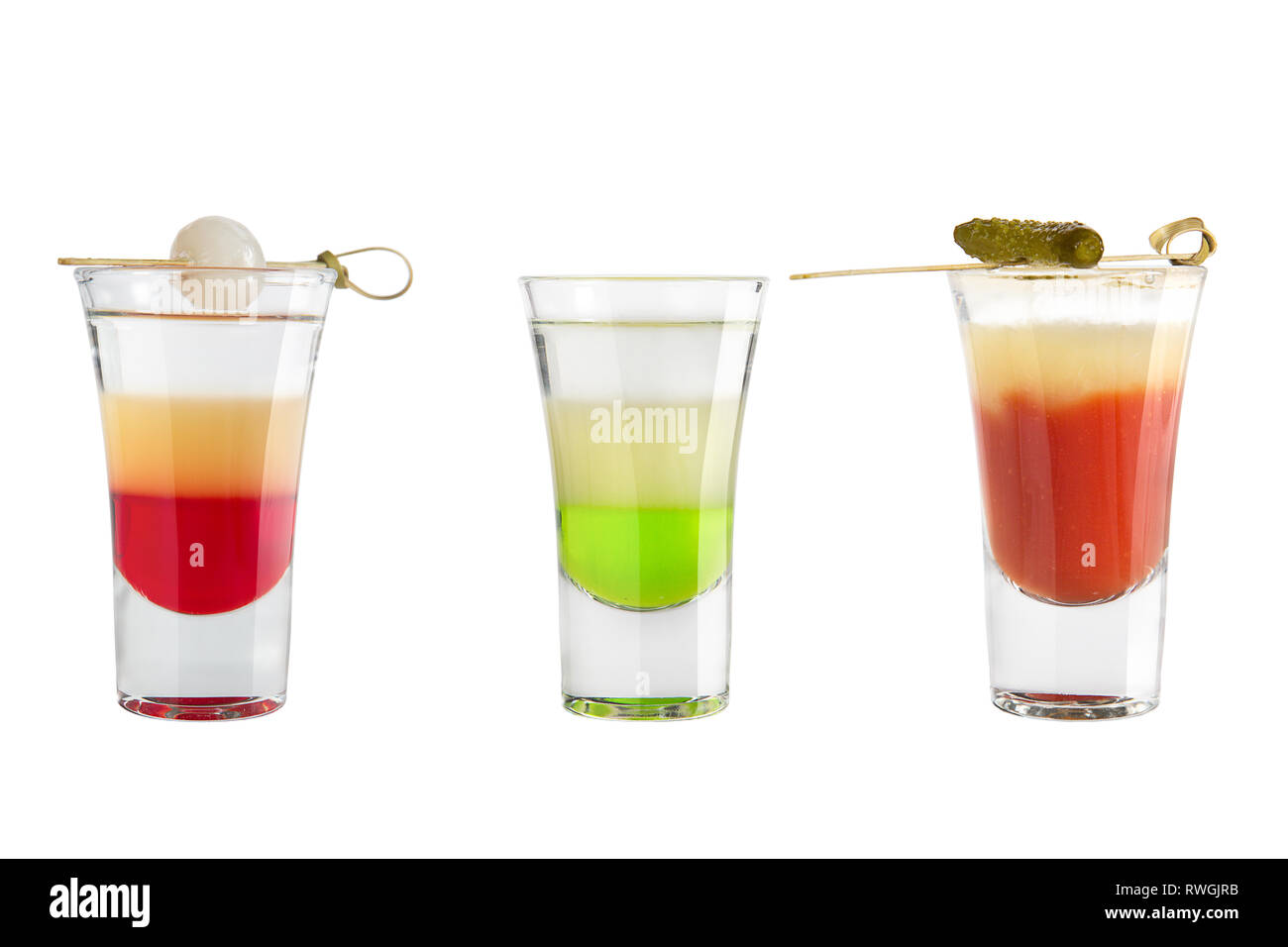 Popular alcohol shots on a white background. Three different shots ...