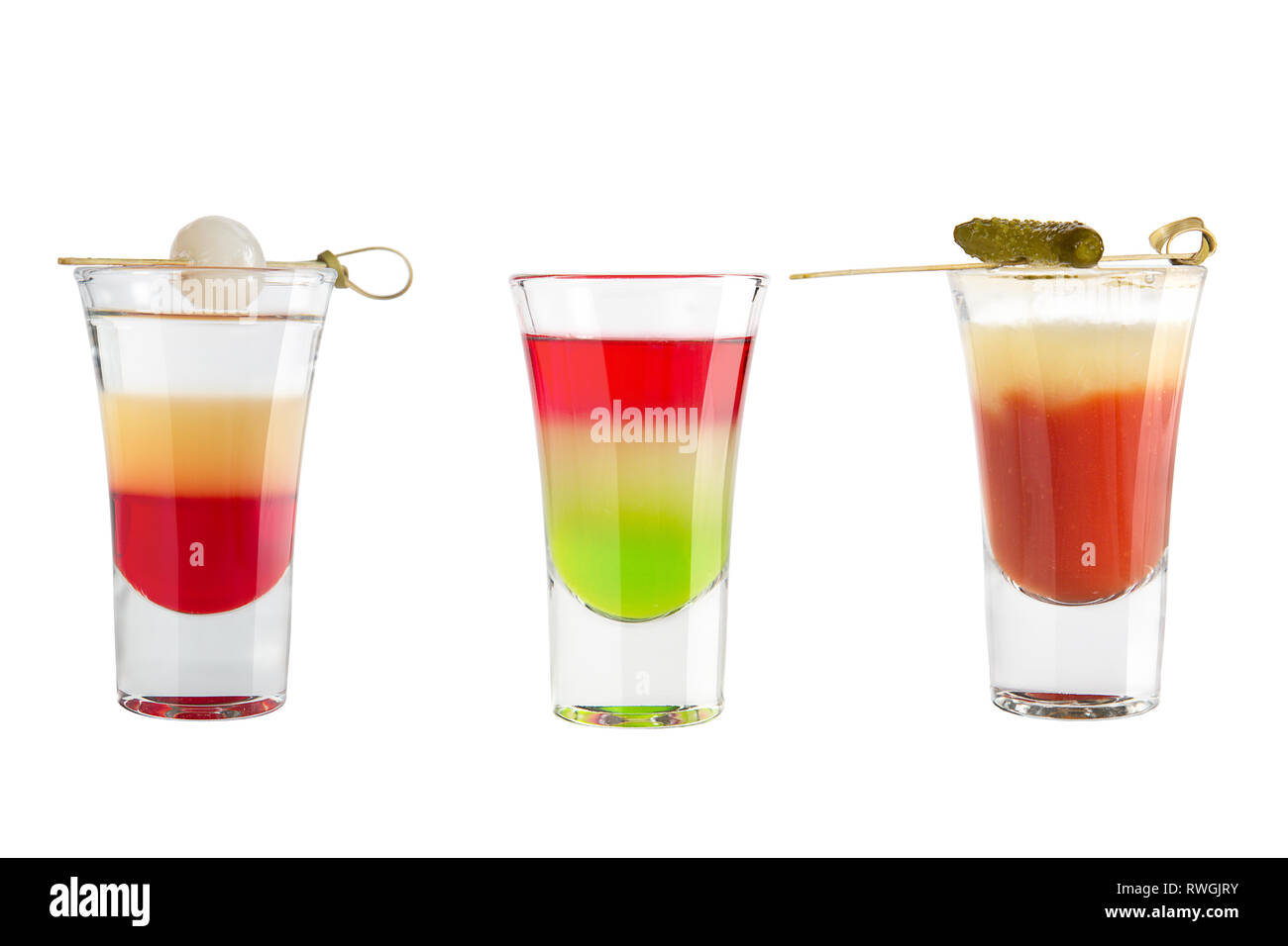 Popular alcohol shots on a white background. Three alcohol shots ...