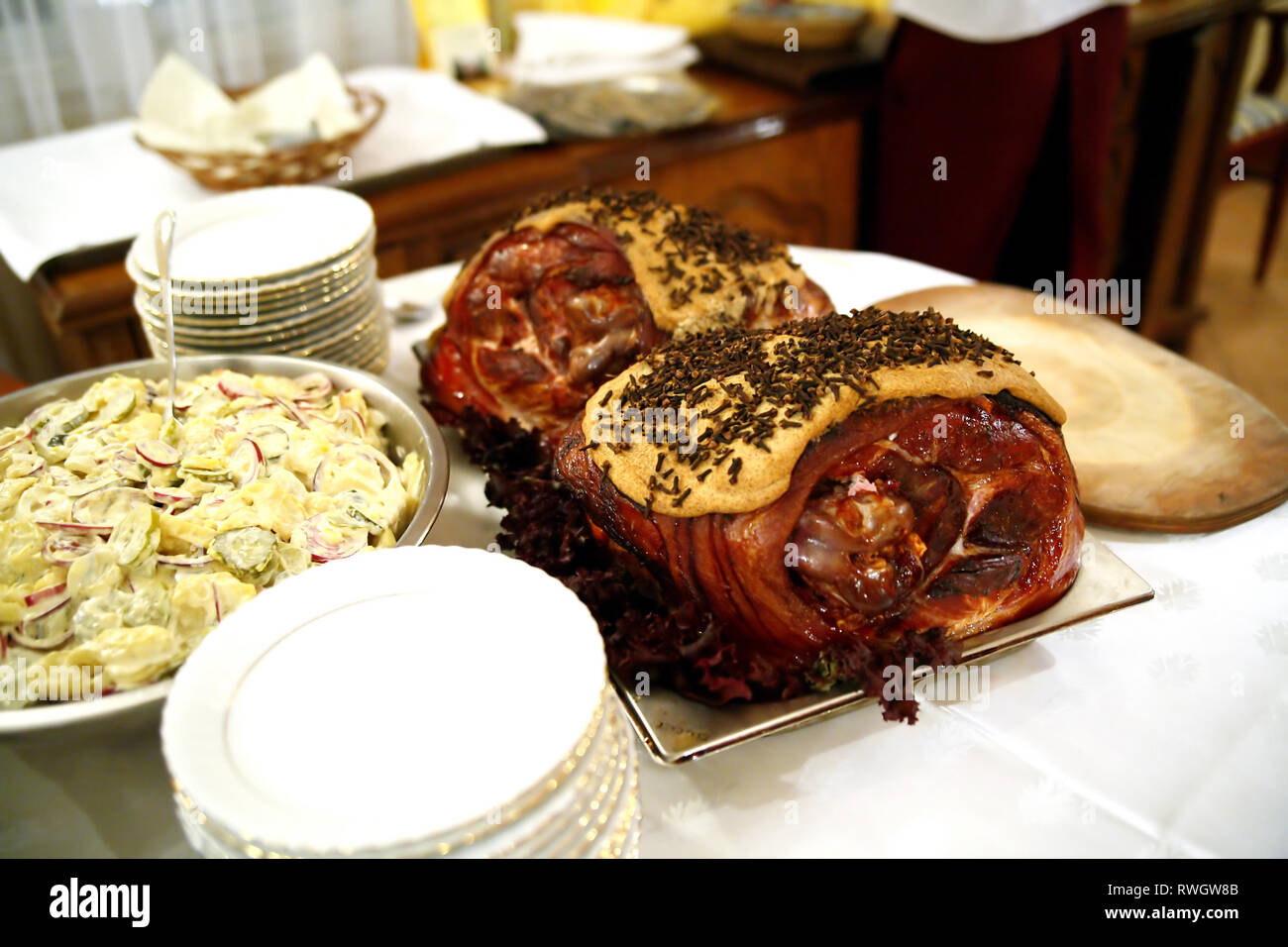 big piece of pork meat on wedding party Stock Photo - Alamy