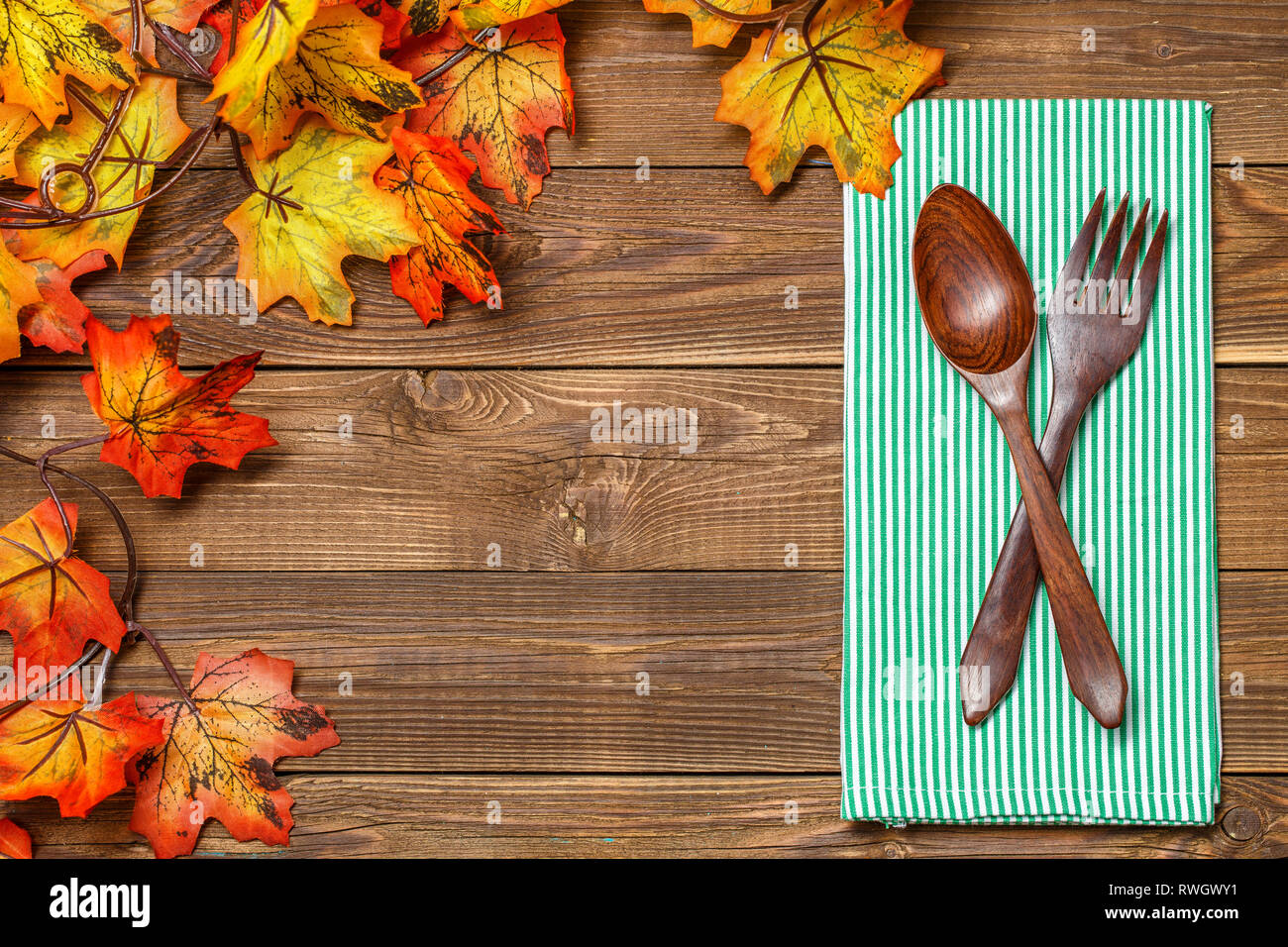 Wooden background with fork , spoon Stock Photo - Alamy