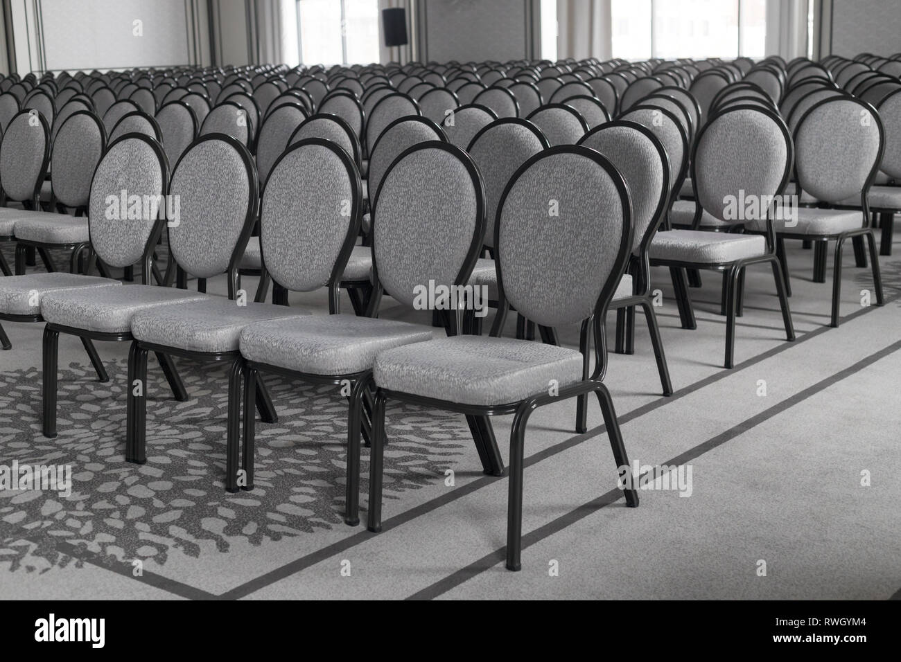 Empty conference hall. Empty rows of chairs. Monochrome Stock Photo - Alamy