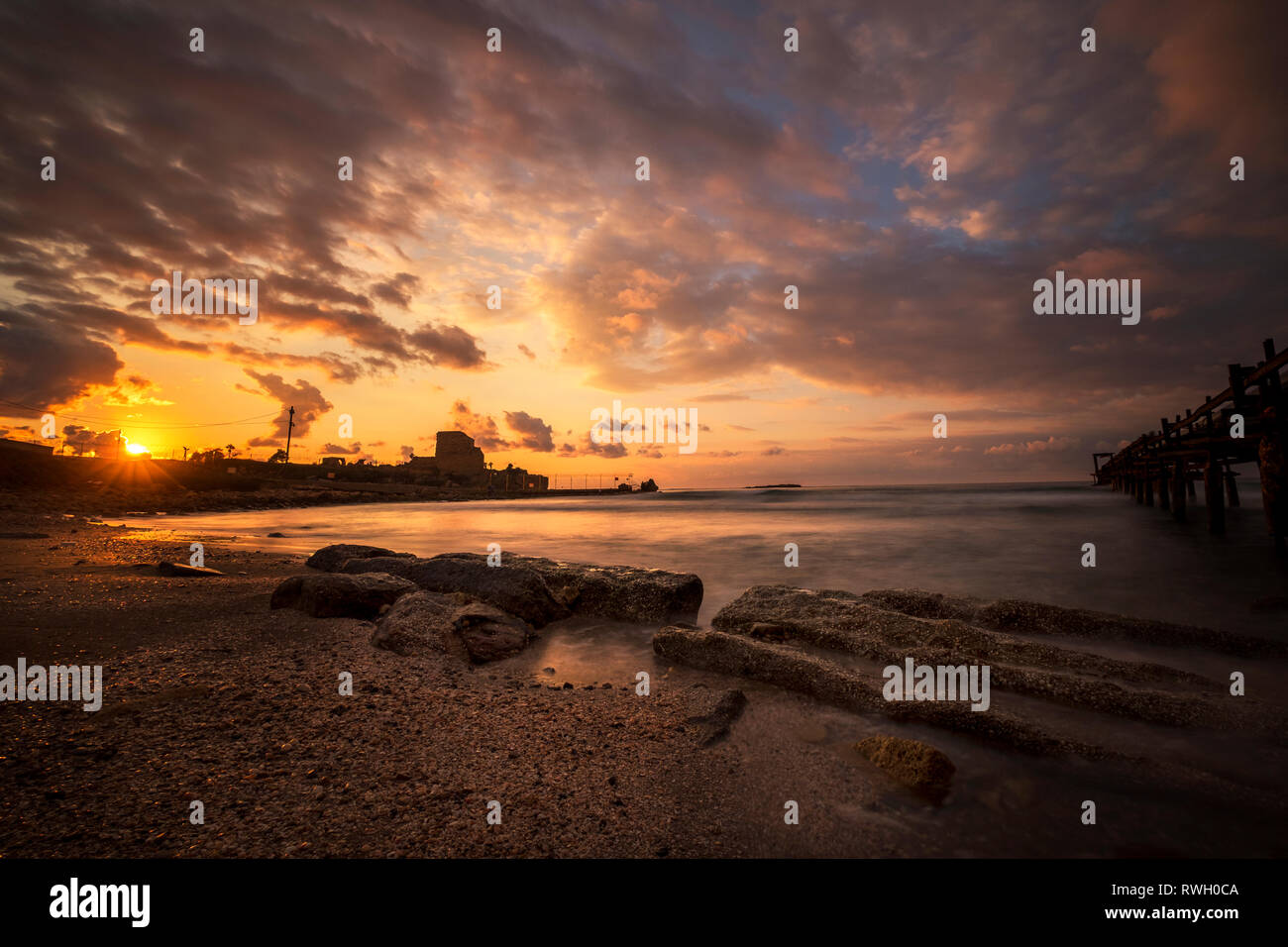 sunset at Atlit beach, Israel Stock Photo - Alamy