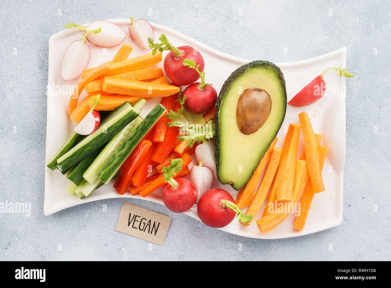 Mixed fresh vegetable sticks. Vegan snack concept. Cucumber, carrot ...