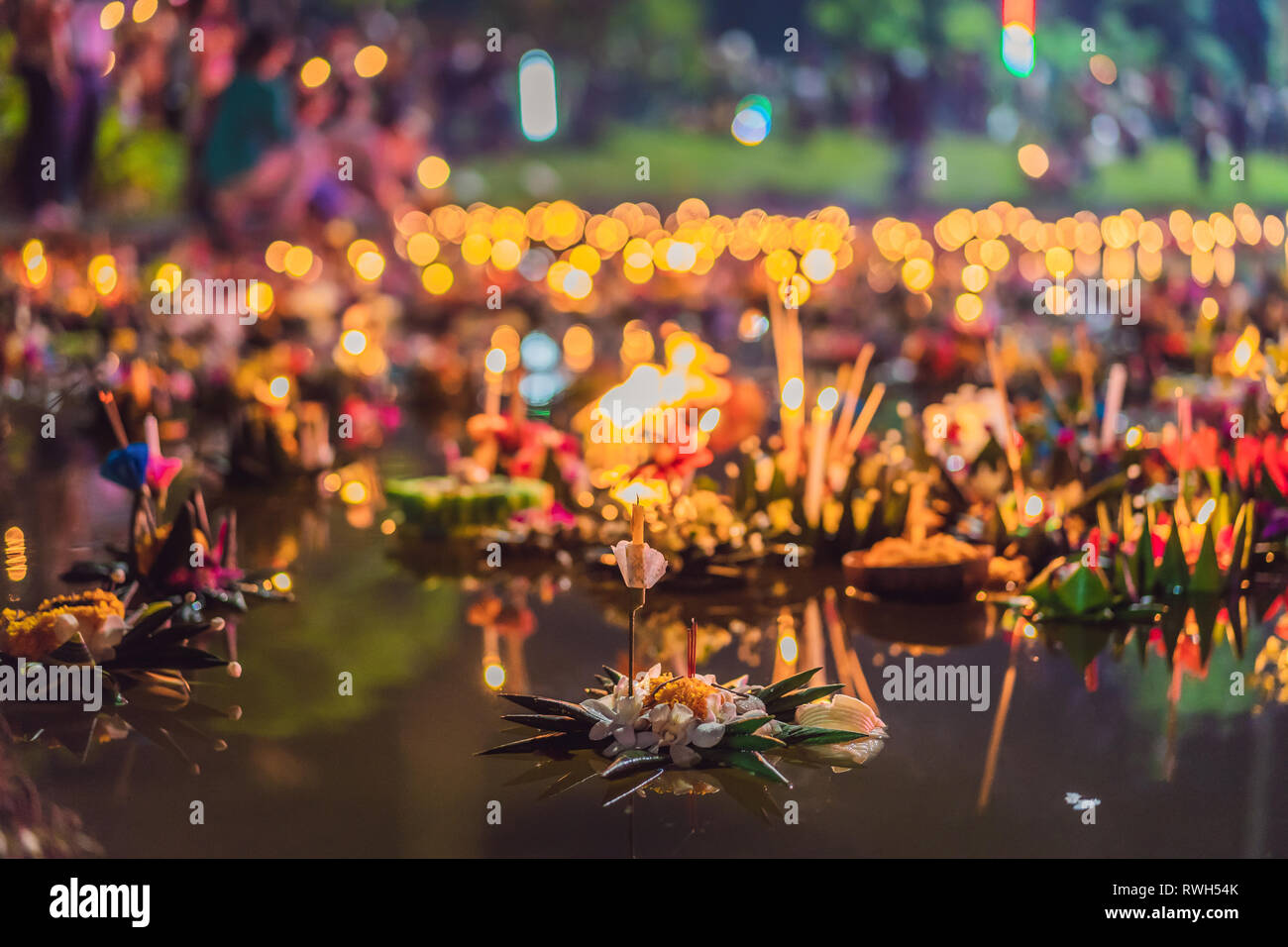 Loy Krathong festival, People buy flowers and candle to light and float ...