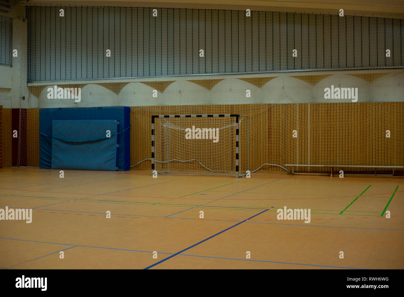 Soccer ball in a modern gym Stock Photo - Alamy