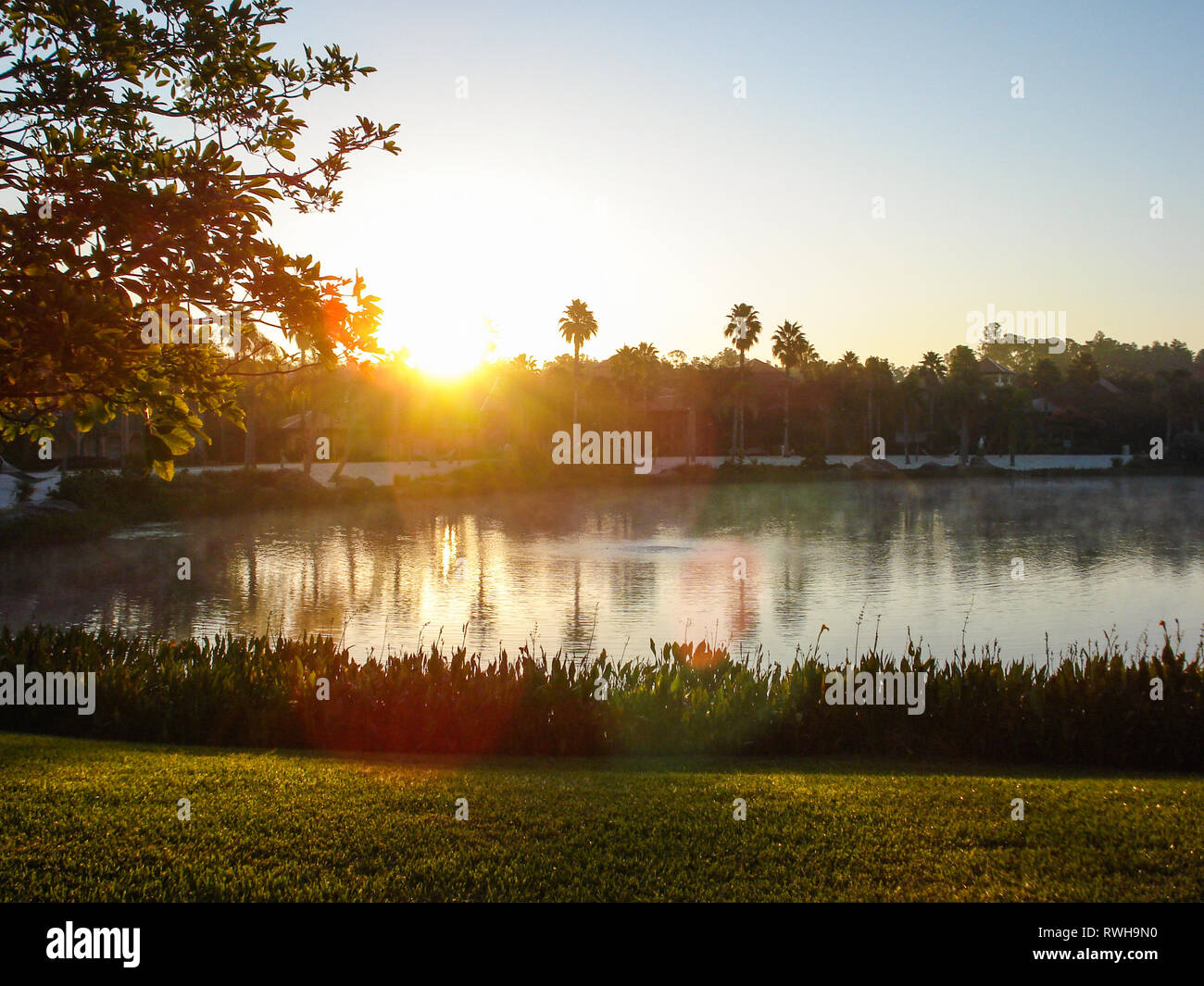 Calm water sunset hi-res stock photography and images - Alamy