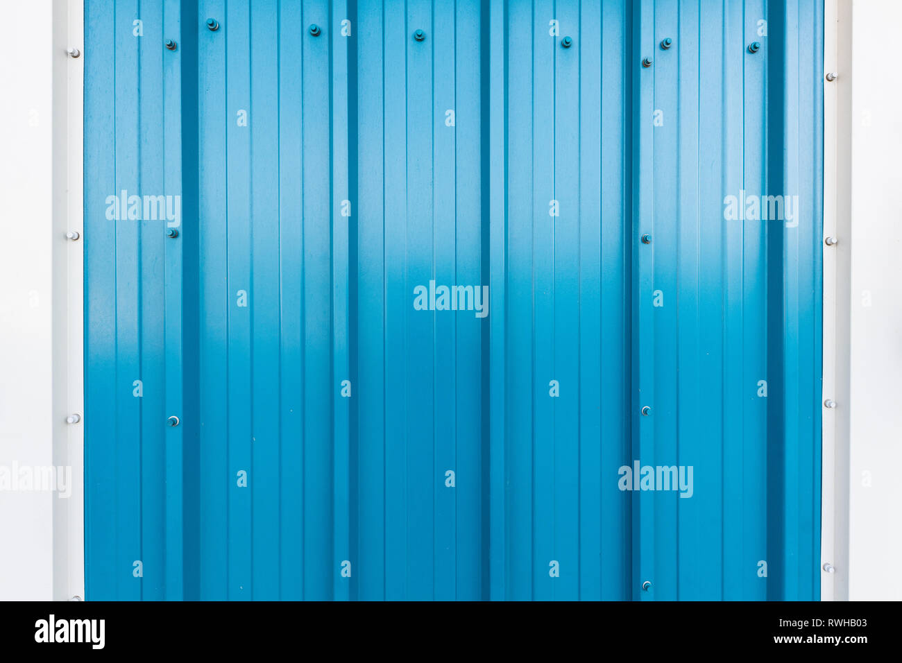 Blue metal Panelled walls Stock Photo - Alamy