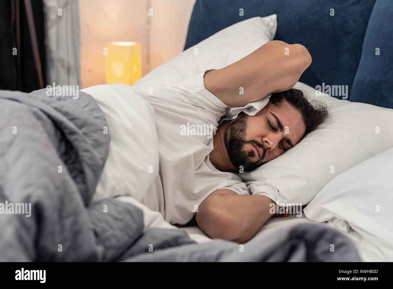Nice good looking man sleeping in the morning Stock Photo - Alamy