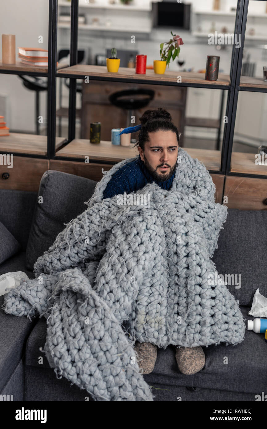 Sad ill man feeling not very good Stock Photo - Alamy