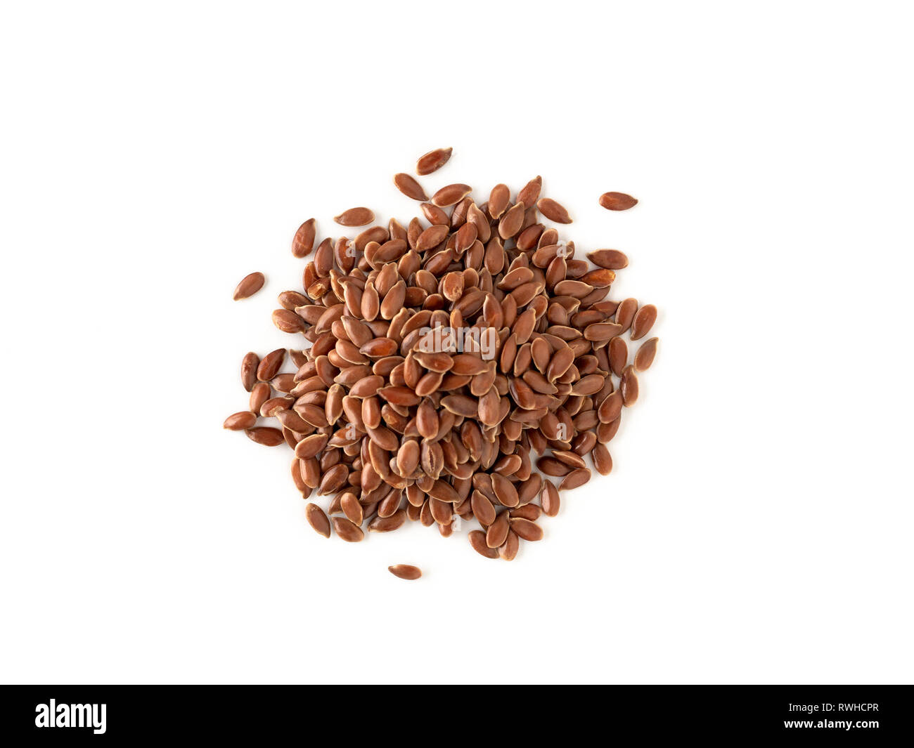 Close up of flax seeds isolated on white background. Linseed pile closeup isolated on white with ...