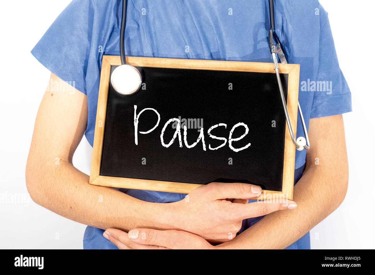 Doctor shows information on blackboard: pause. Medical concept Stock ...