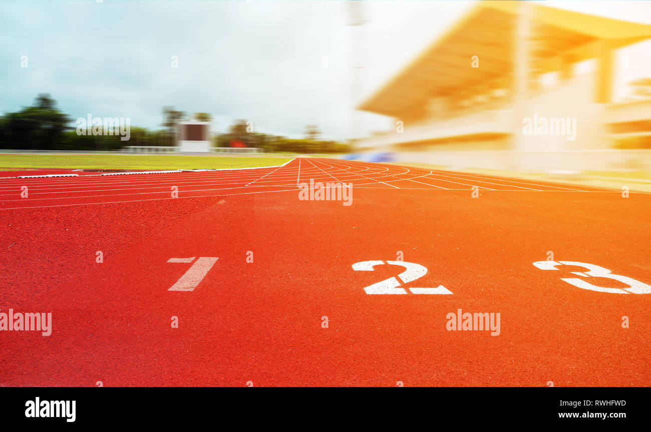 track and running red flag on a background of blue sky and clouds Stock ...