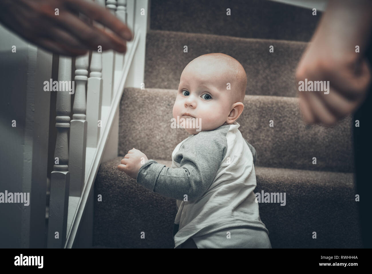 Baby climbing stairs hi-res stock photography and images - Alamy