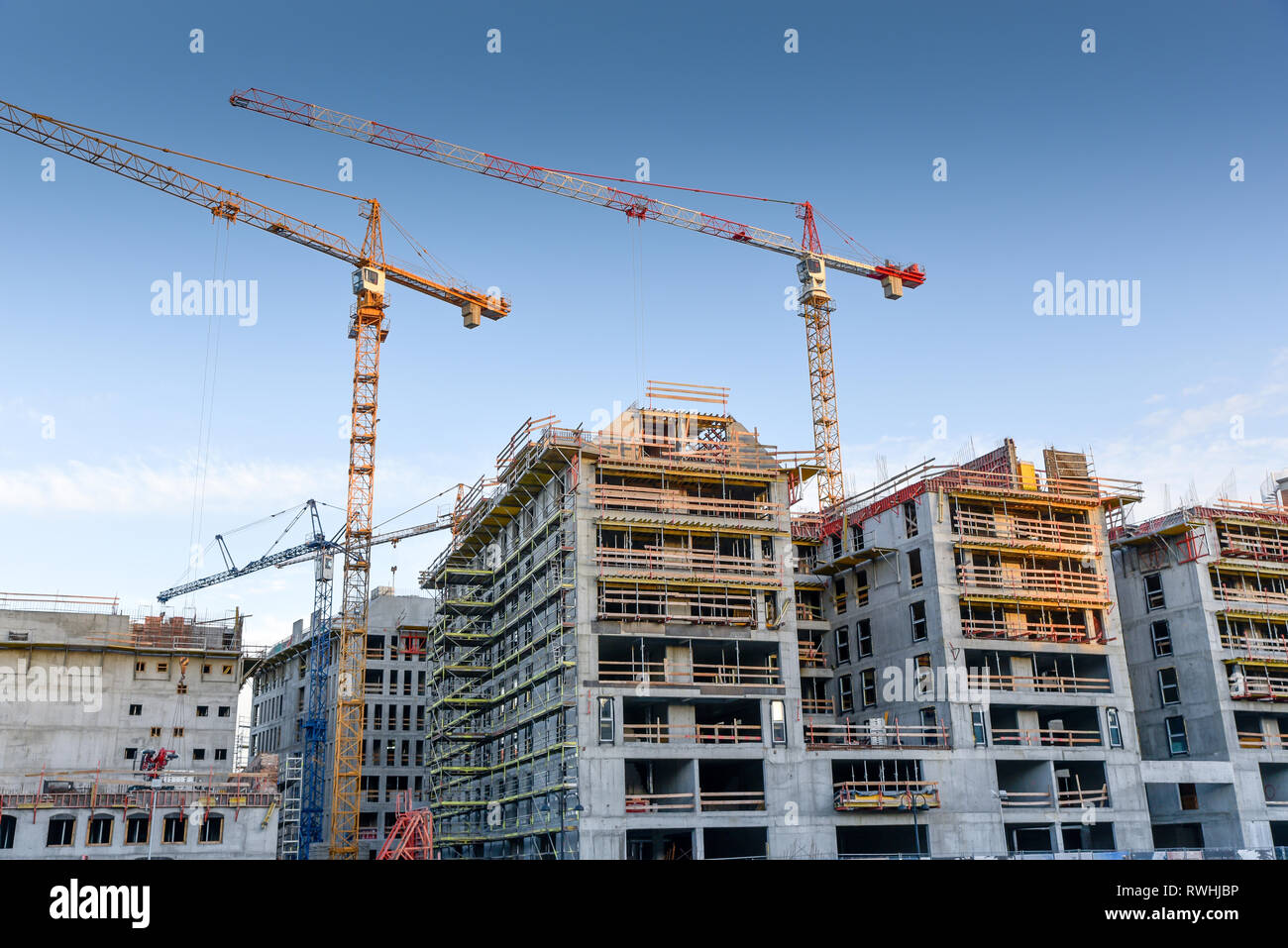 Crane Building New House on the Construction Site. House building and ...