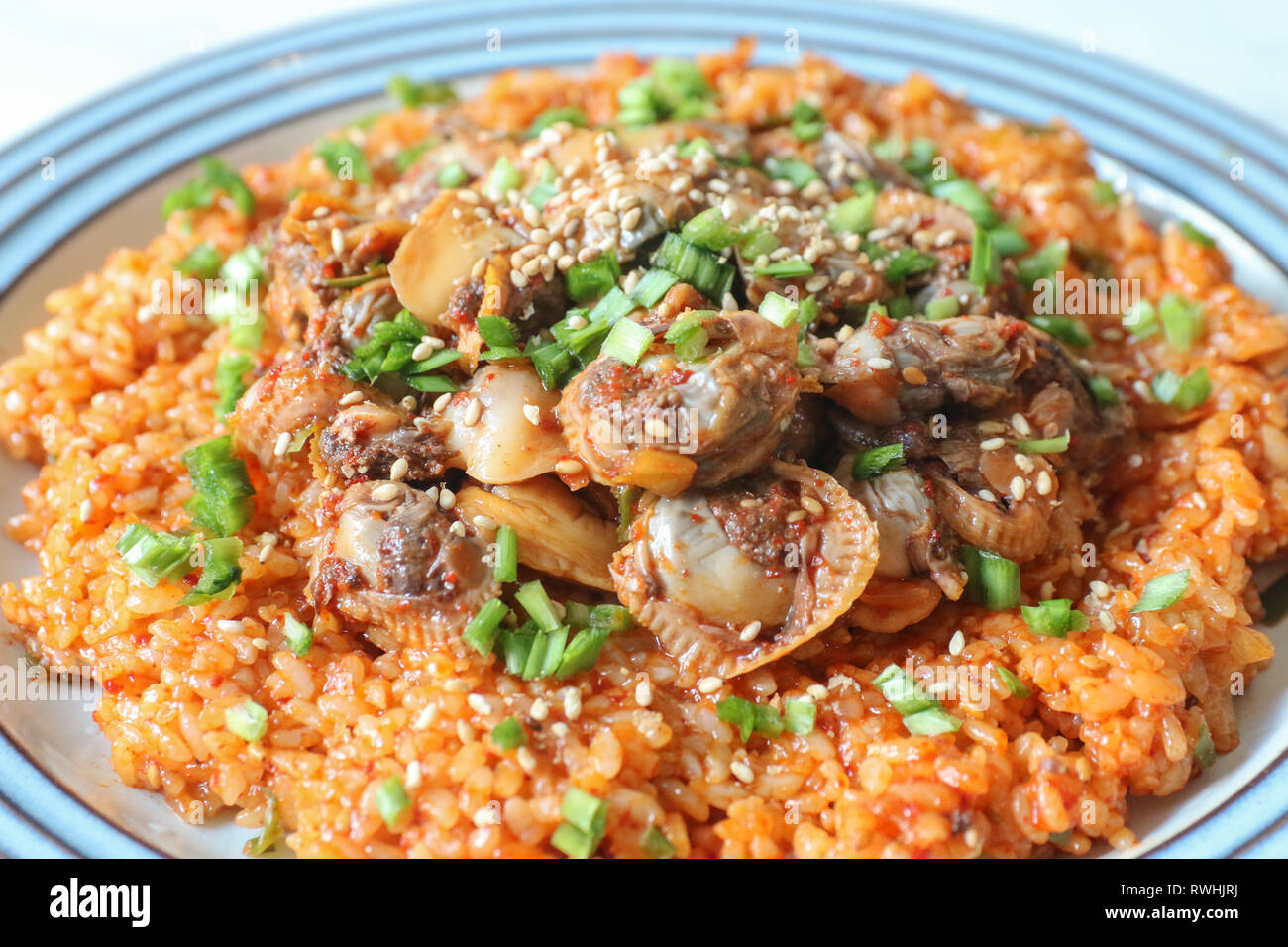 Cockle bibimbap, Korean traditional winter season food Stock Photo - Alamy