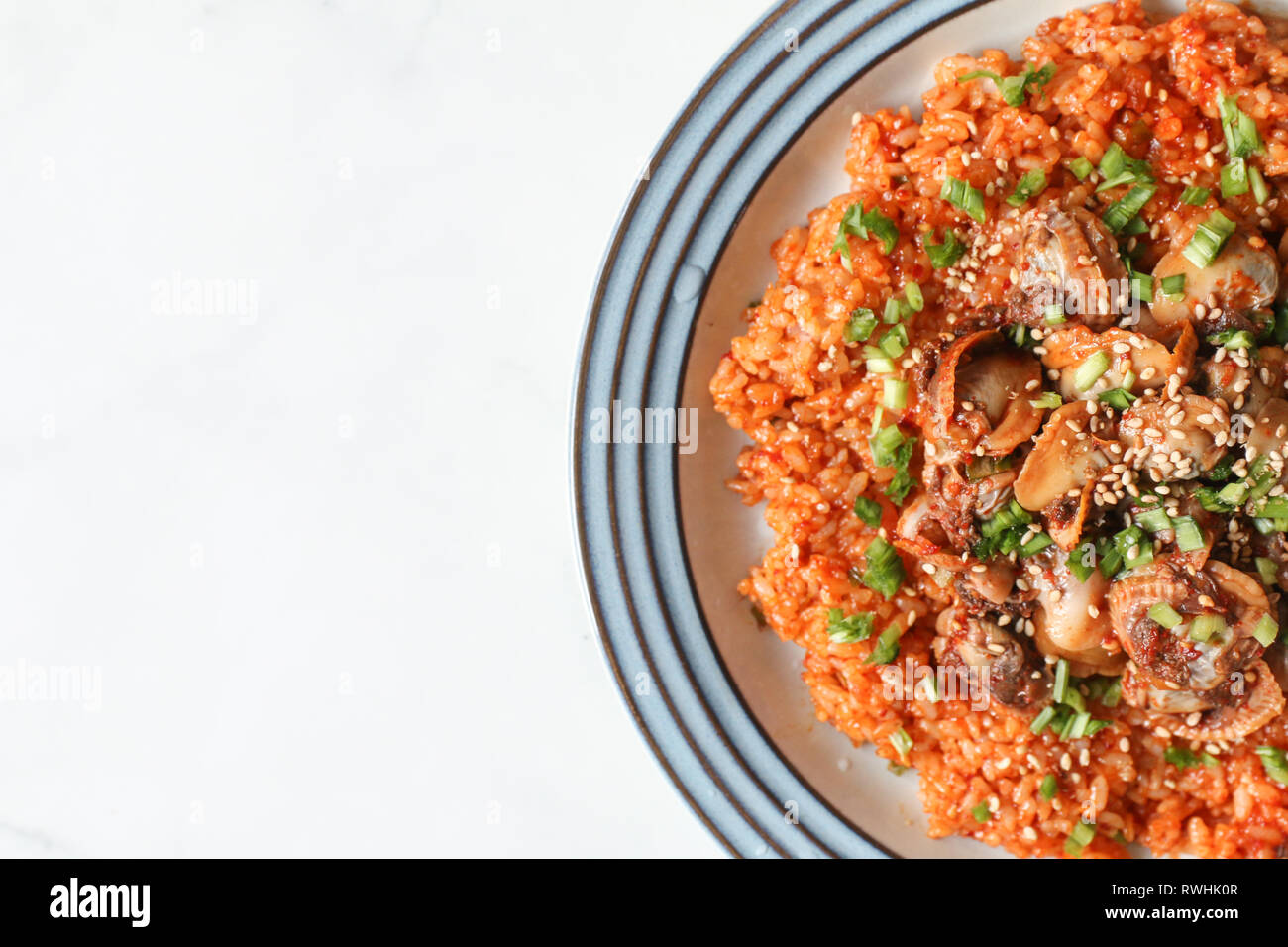 Cockle bibimbap, Korean traditional winter season food Stock Photo - Alamy