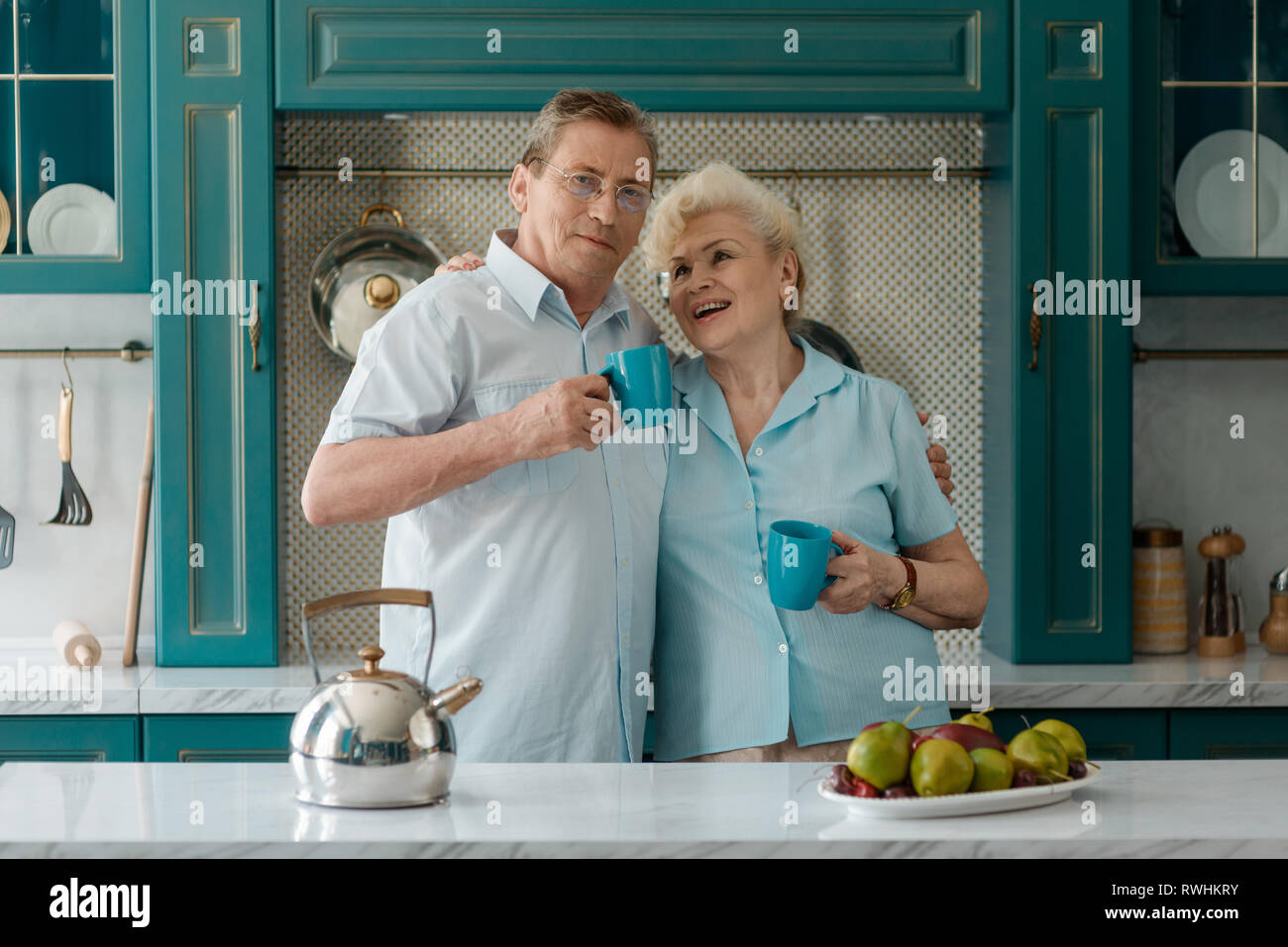 Old people drinking tea together Stock Photo - Alamy