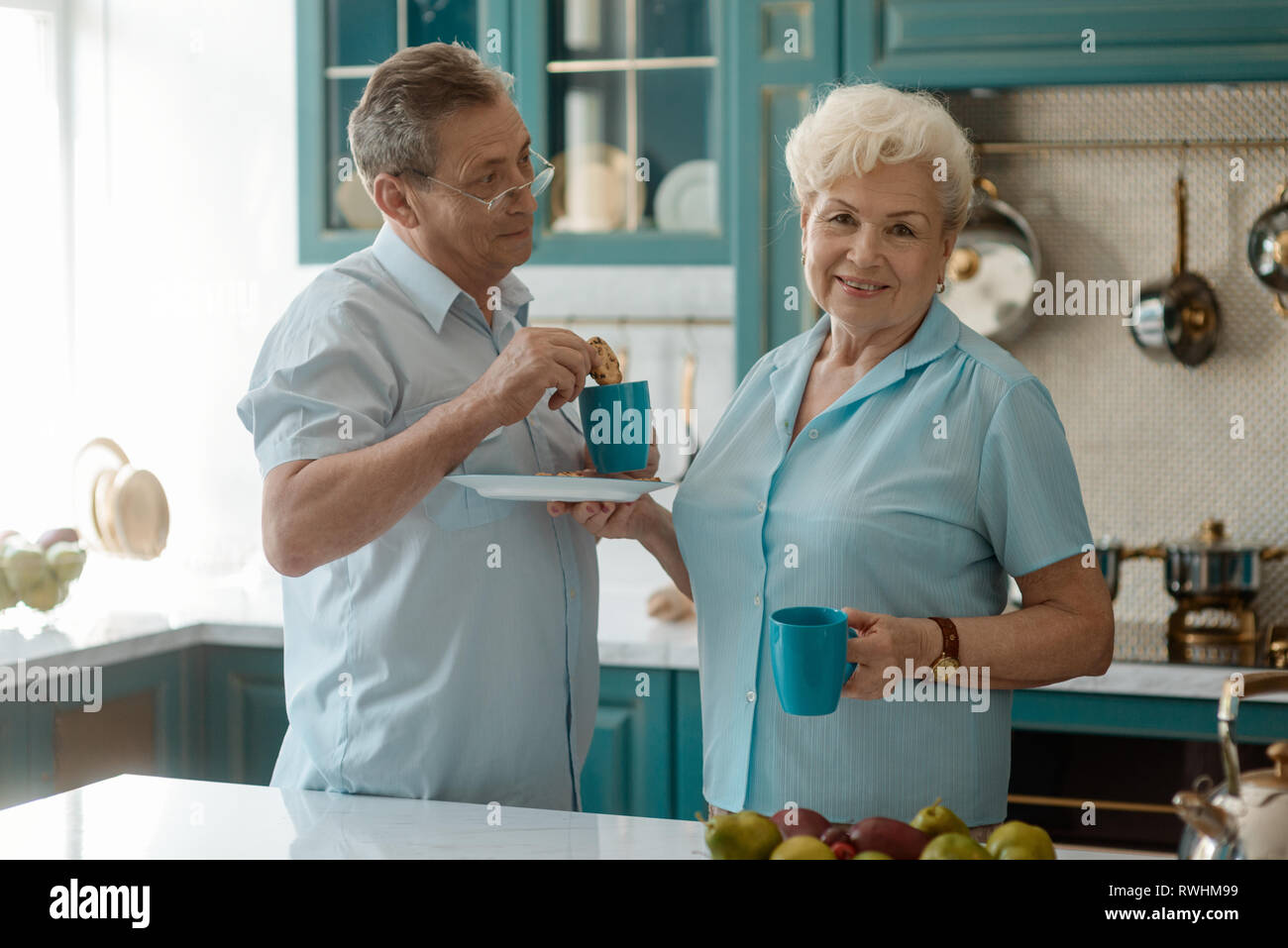 Old lady serving tea hi-res stock photography and images - Alamy