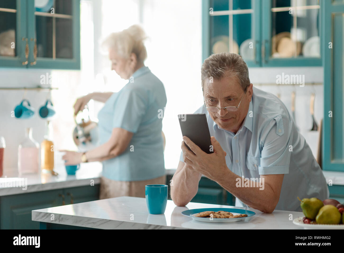 Old person smart watch home hi-res stock photography and images - Alamy