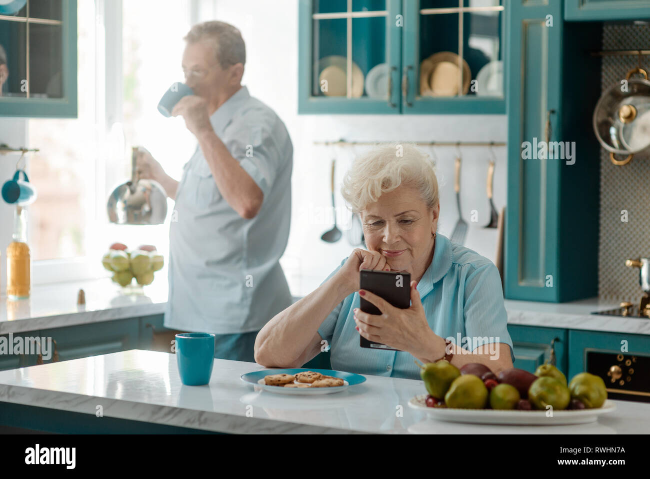 Granny using a cell phone Stock Photo - Alamy