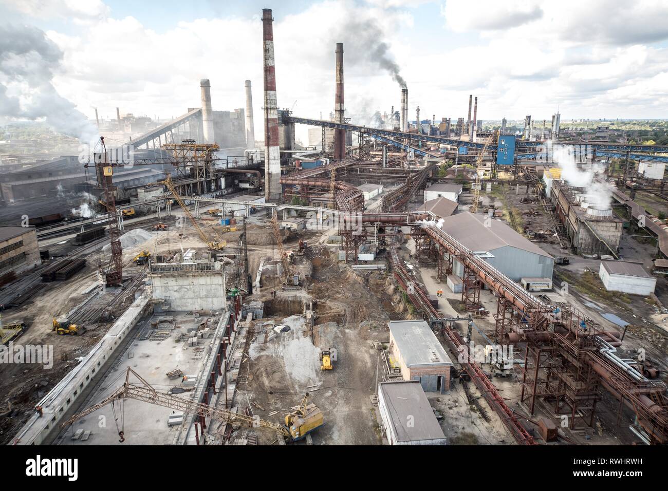 landscape, panorama, view of factory slums with metal hulls and ...